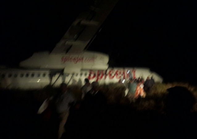 Passengers being evacuated from the Spicejet flight that hit boars at ...