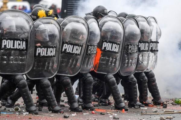 Argentine police try to subdue violent protests in Buenos Aires ...