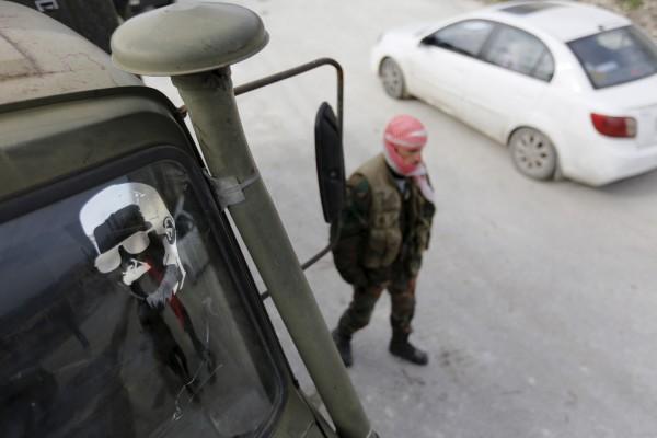 Assad forces recapture key southern town from rebel fighters - Photos ...