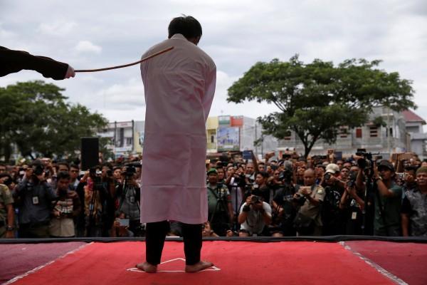 Two Men Publicly Caned In Indonesia For Having Gay Sex Photos Images